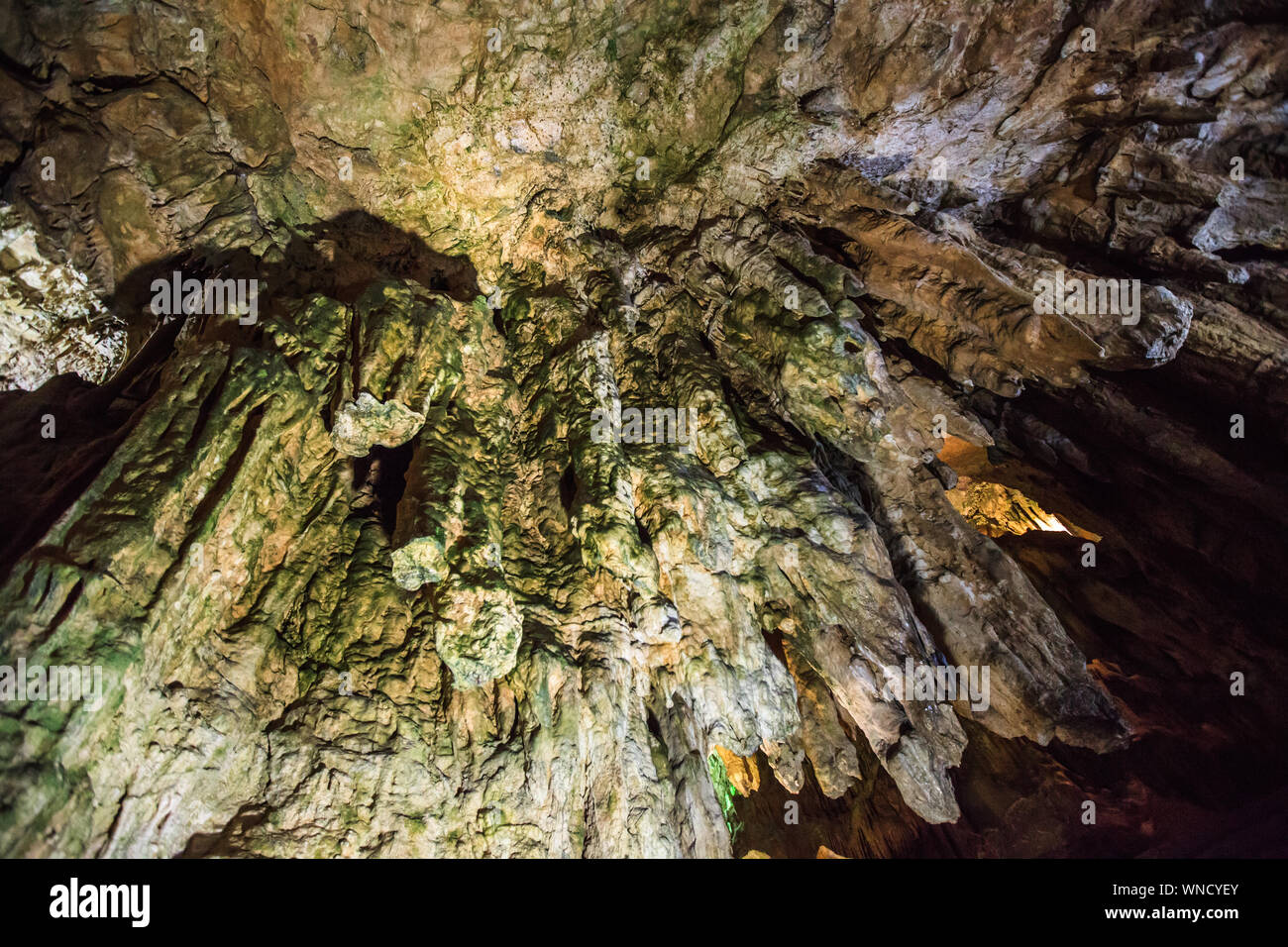 Cave decoration, massive columns of stalagmites and stalactites ...