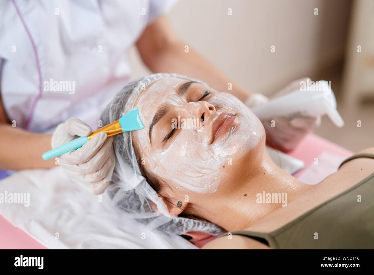 Woman using body brush hi-res stock photography and images - Alamy