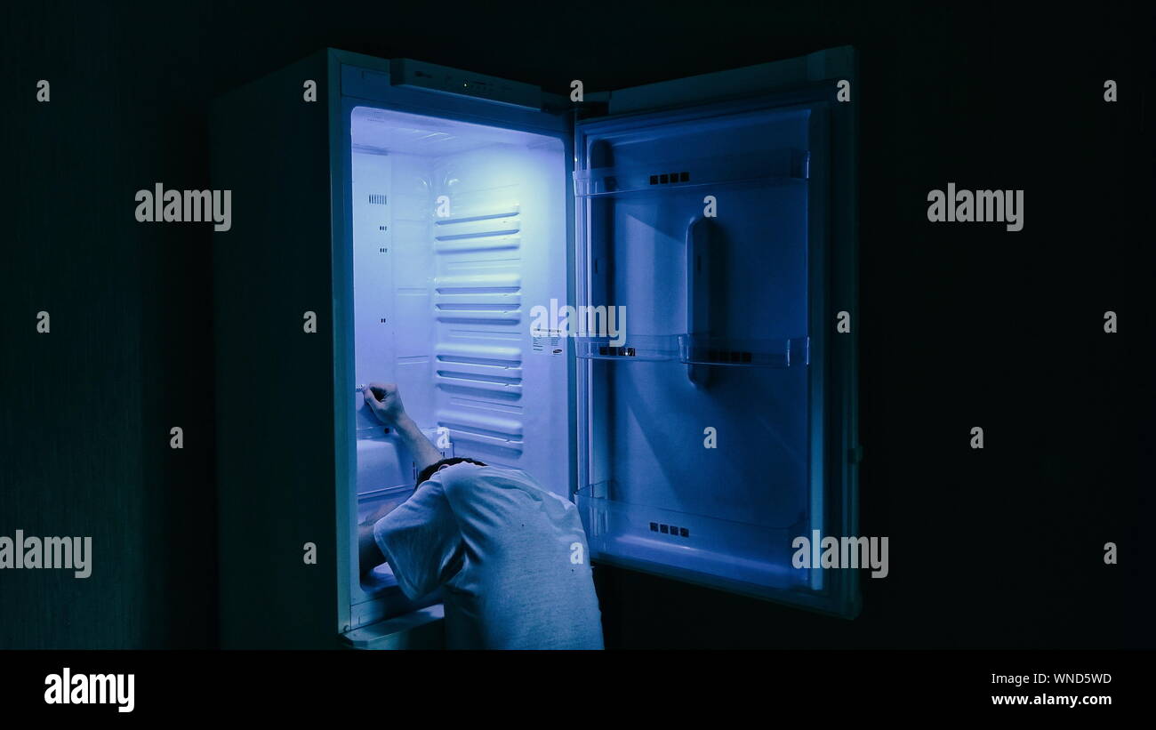 Man refrigerator hi-res stock photography and images - Alamy