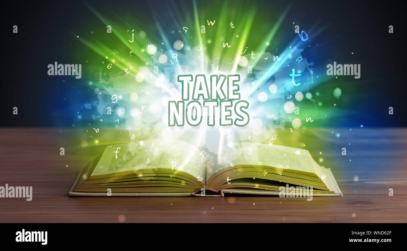 TAKE NOTES inscription coming out from an open book, educational ...