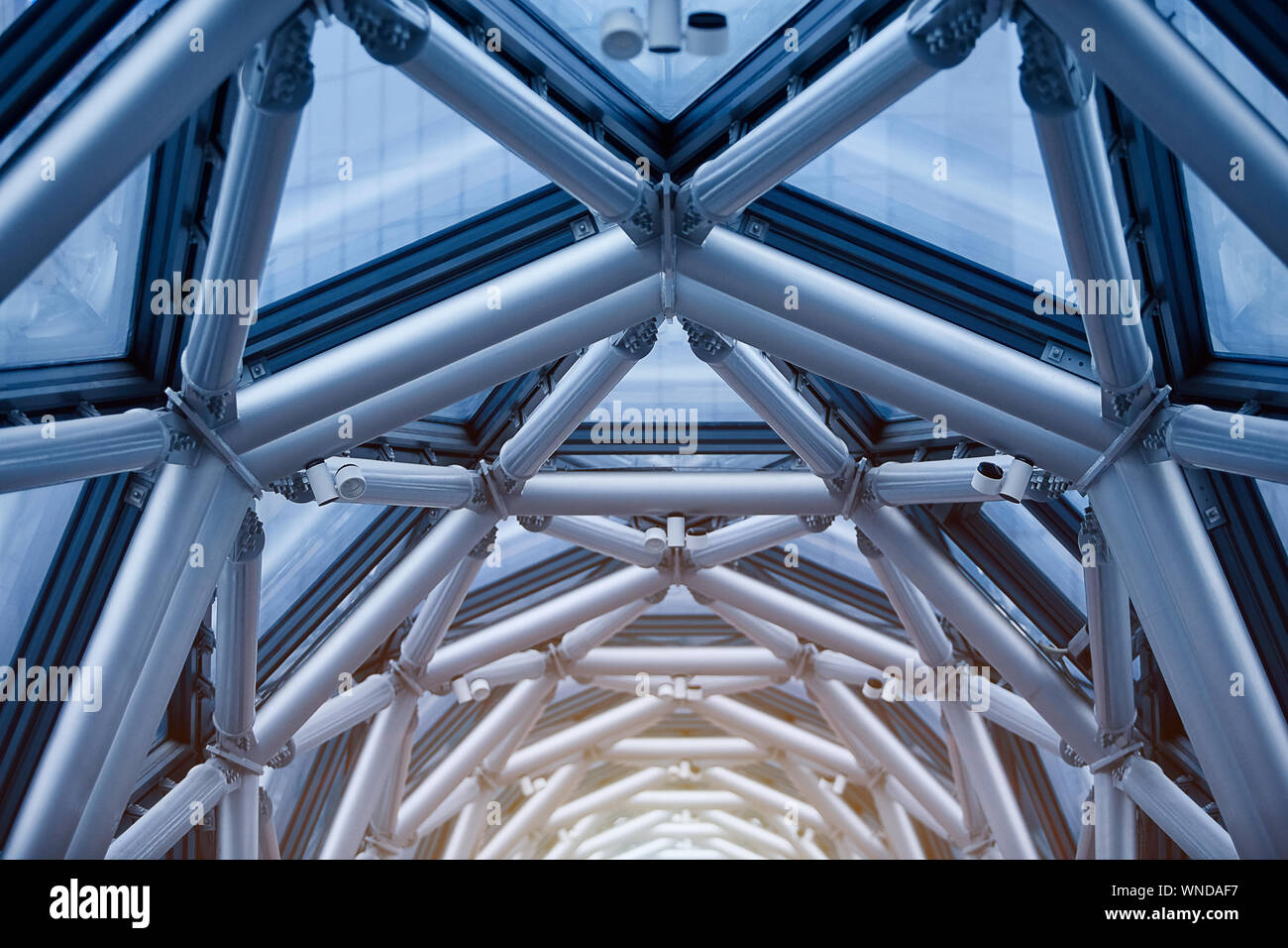 The passage connecting the two buildings, decorated with metal pipes ...