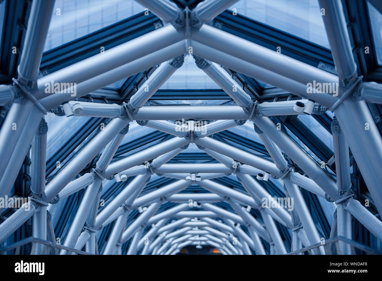 The passage connecting the two buildings, decorated with metal pipes ...
