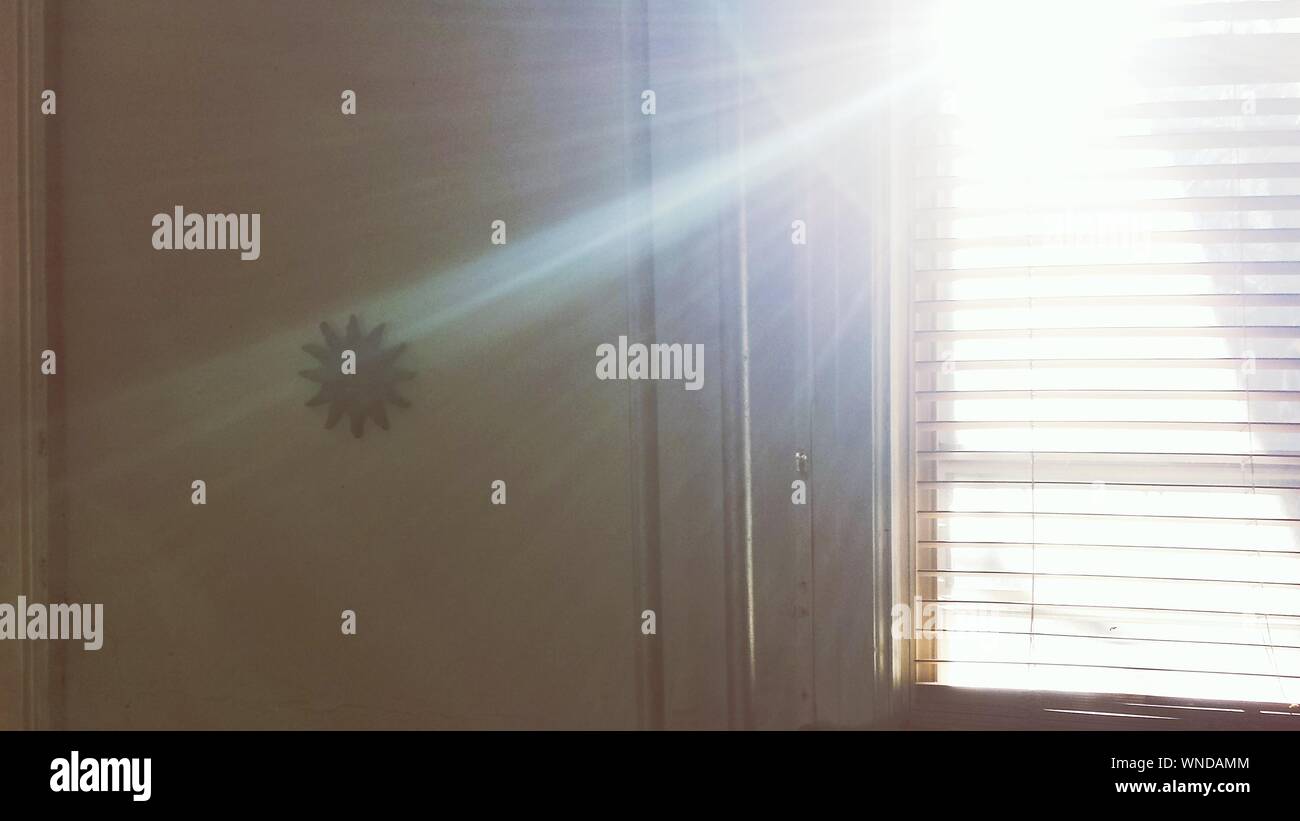 Shining through the curtain hi-res stock photography and images - Alamy