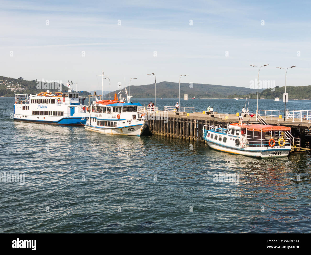 CORRAL, CHILE - JANUARY 14, 2018: Passenger ferry docked at the pier of ...