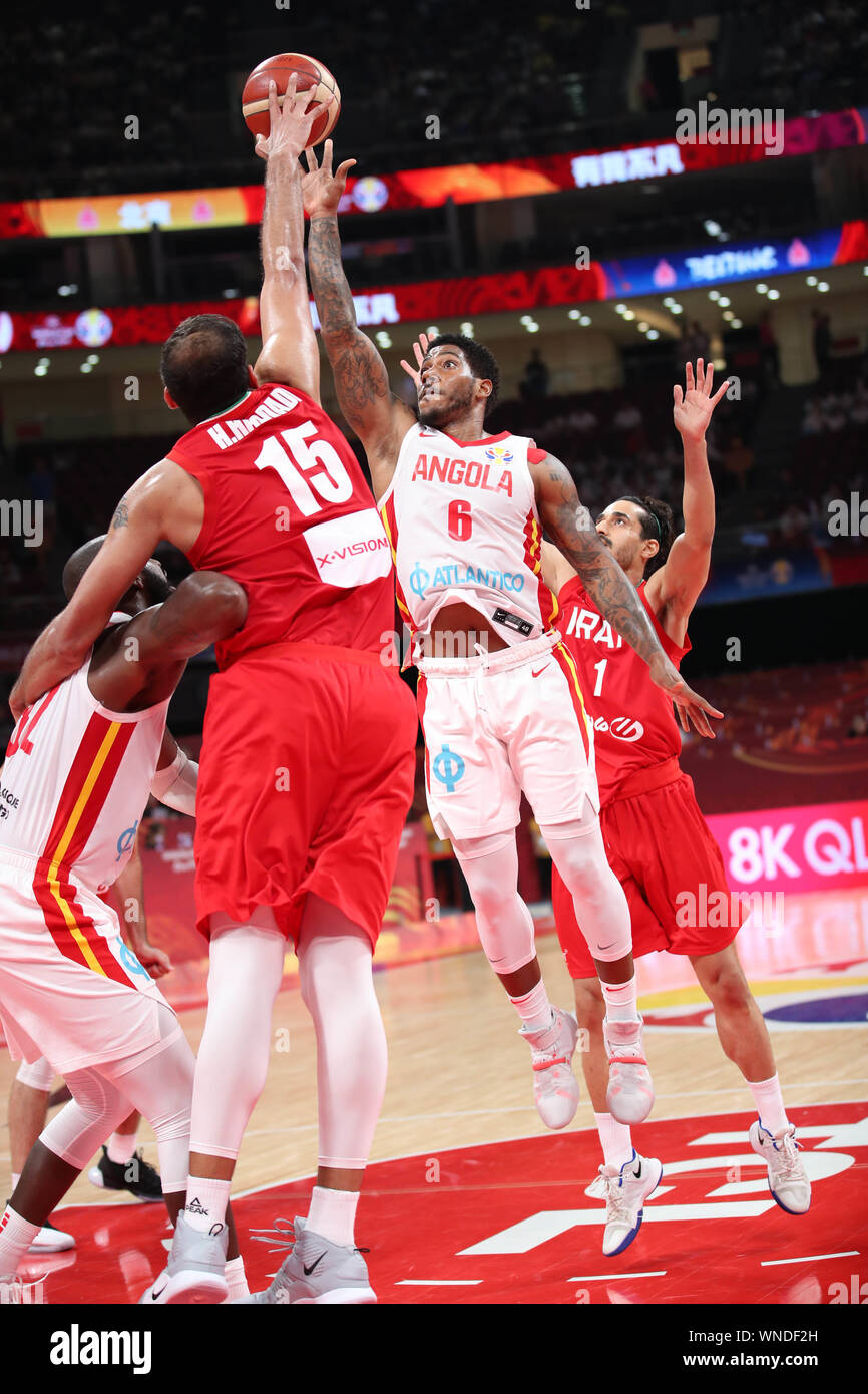 Beijing, China. 6th Sep, 2019. Hamed Haddadi (2nd L) of Iran blocks ...