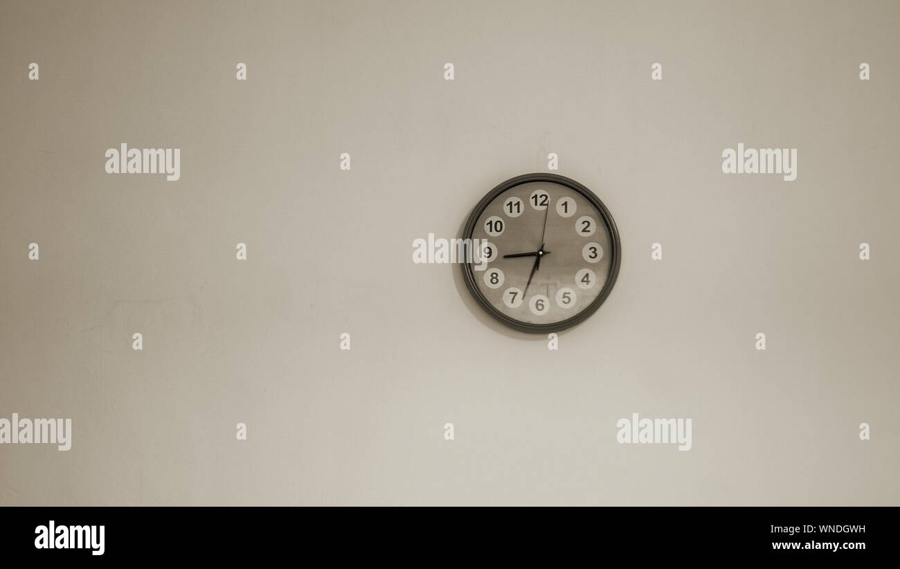 Clock Hanging On Building High Resolution Stock Photography and Images ...