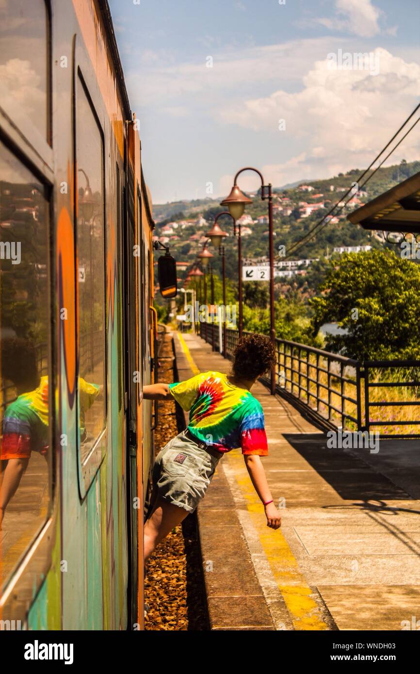 Hanging out of this train hi-res stock photography and images - Alamy