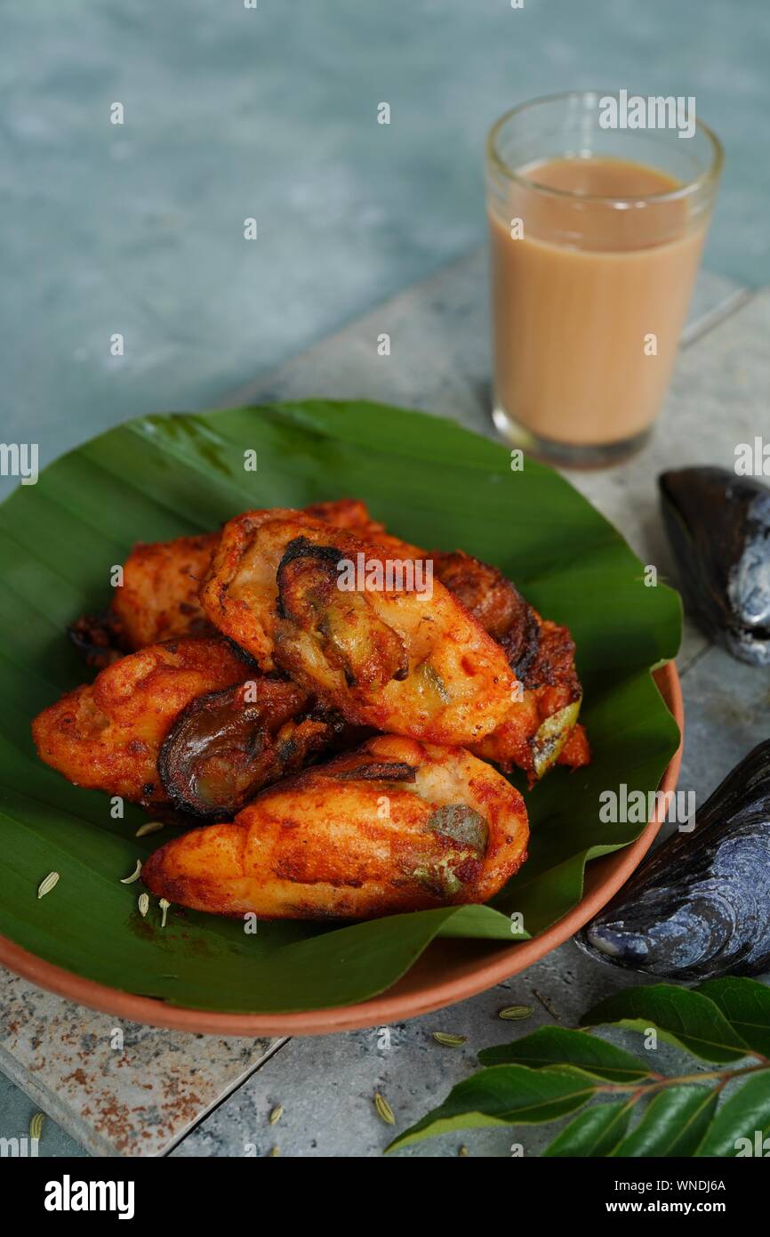 Arikkadukka / Stuffed Mussels Fry - A spicy sea food snack from ...