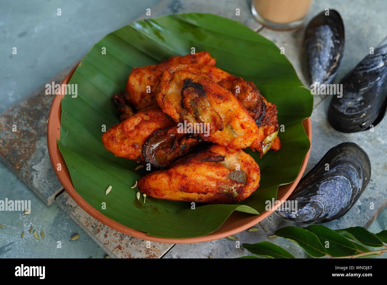 Arikkadukka / Stuffed Mussels Fry - A spicy sea food snack from ...