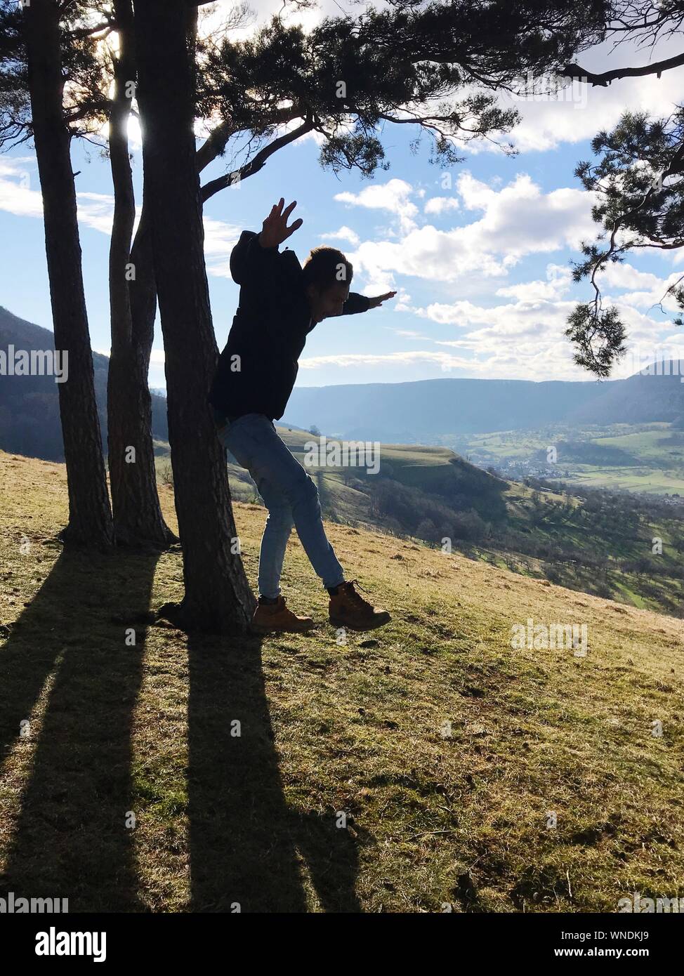 Teenage boy tree hi-res stock photography and images - Alamy