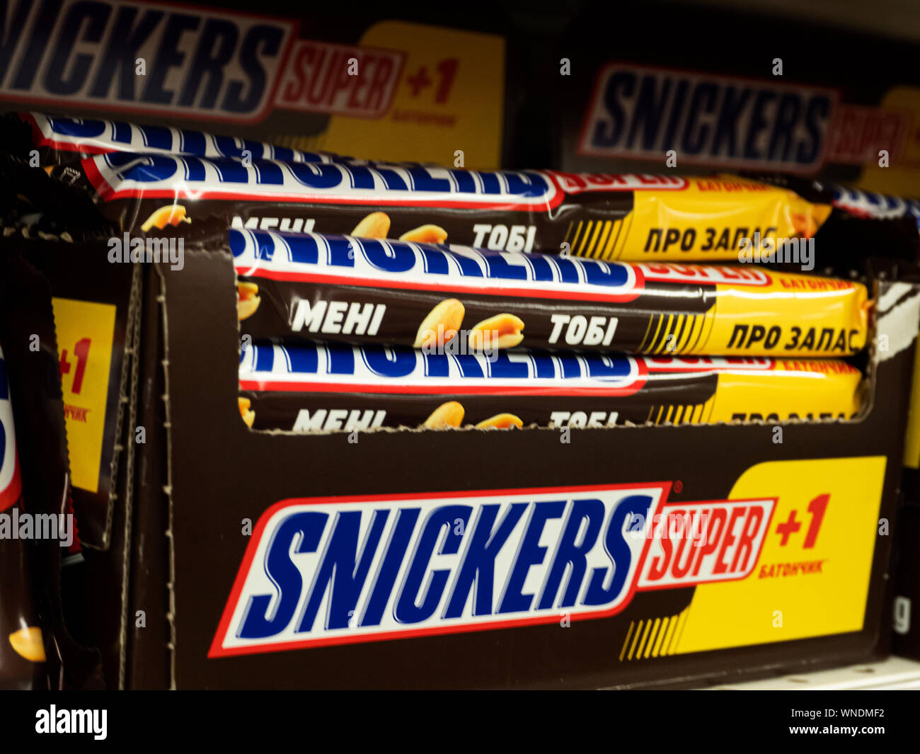 Snickers bars is seen on store shelf Stock Photo - Alamy