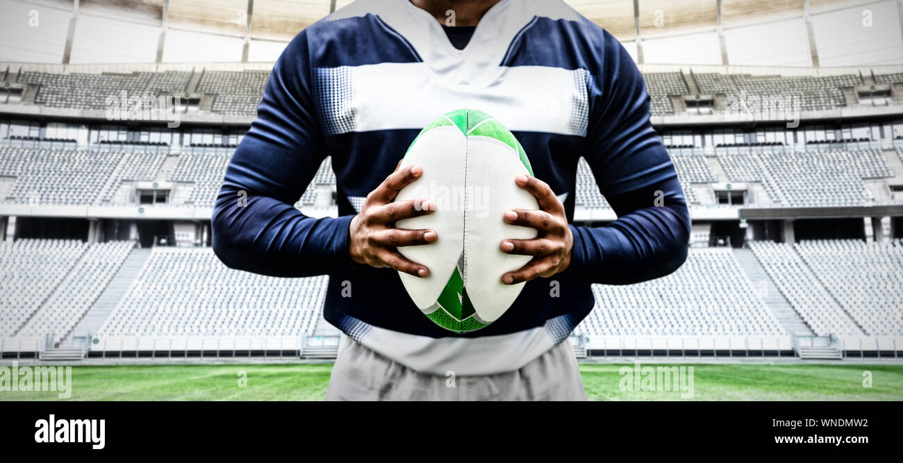 Composite image of strong rugby player Stock Photo - Alamy