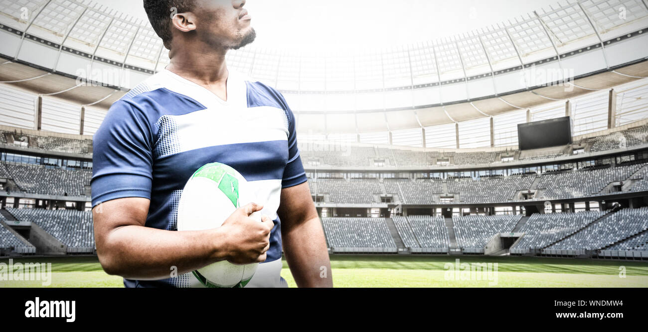 Composite image of strong rugby player Stock Photo - Alamy