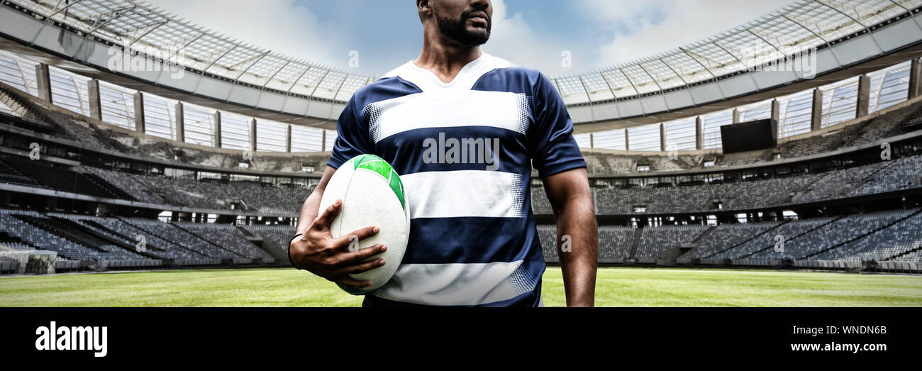 Composite image of strong rugby player Stock Photo - Alamy