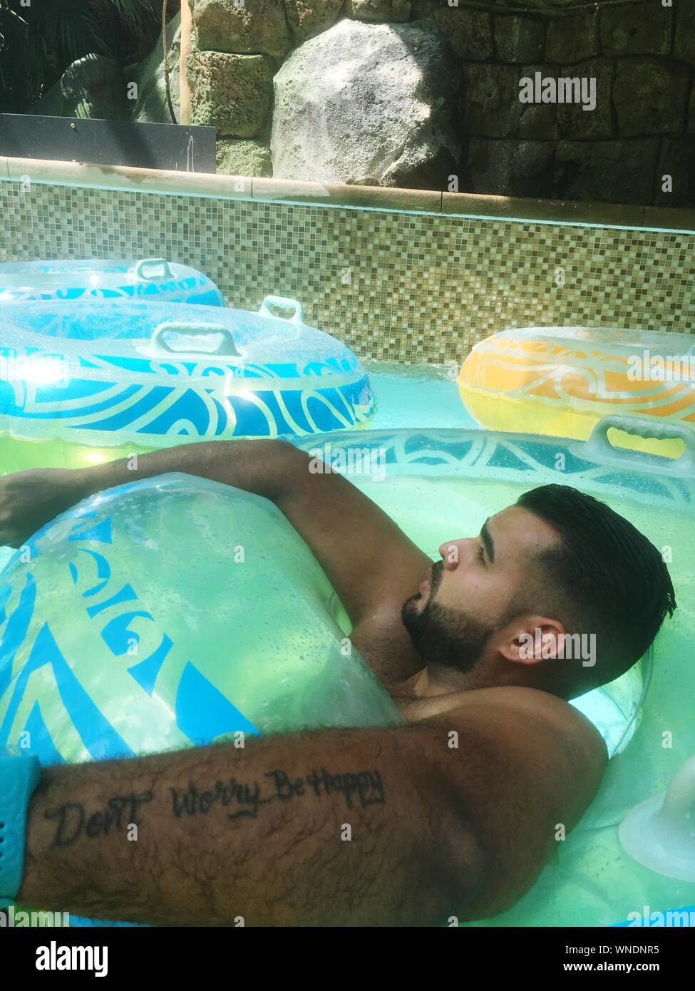 Indian man in swimming pool hi-res stock photography and images - Alamy