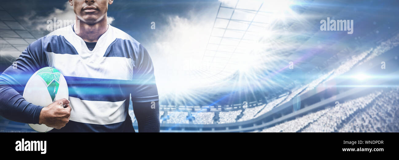 Composite image of strong rugby player Stock Photo - Alamy