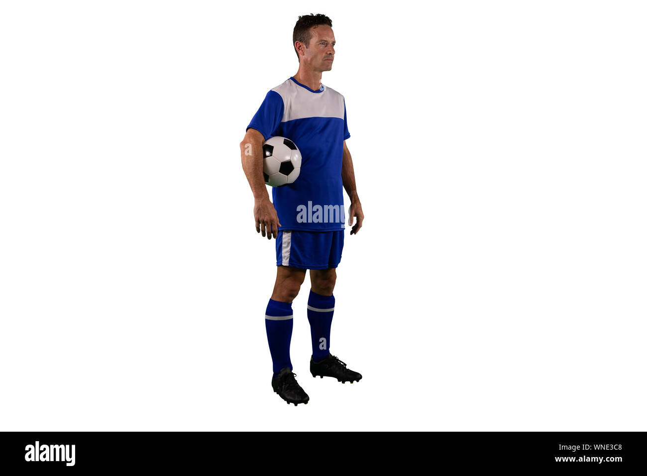 Focused Soccer Player Stock Photo - Alamy