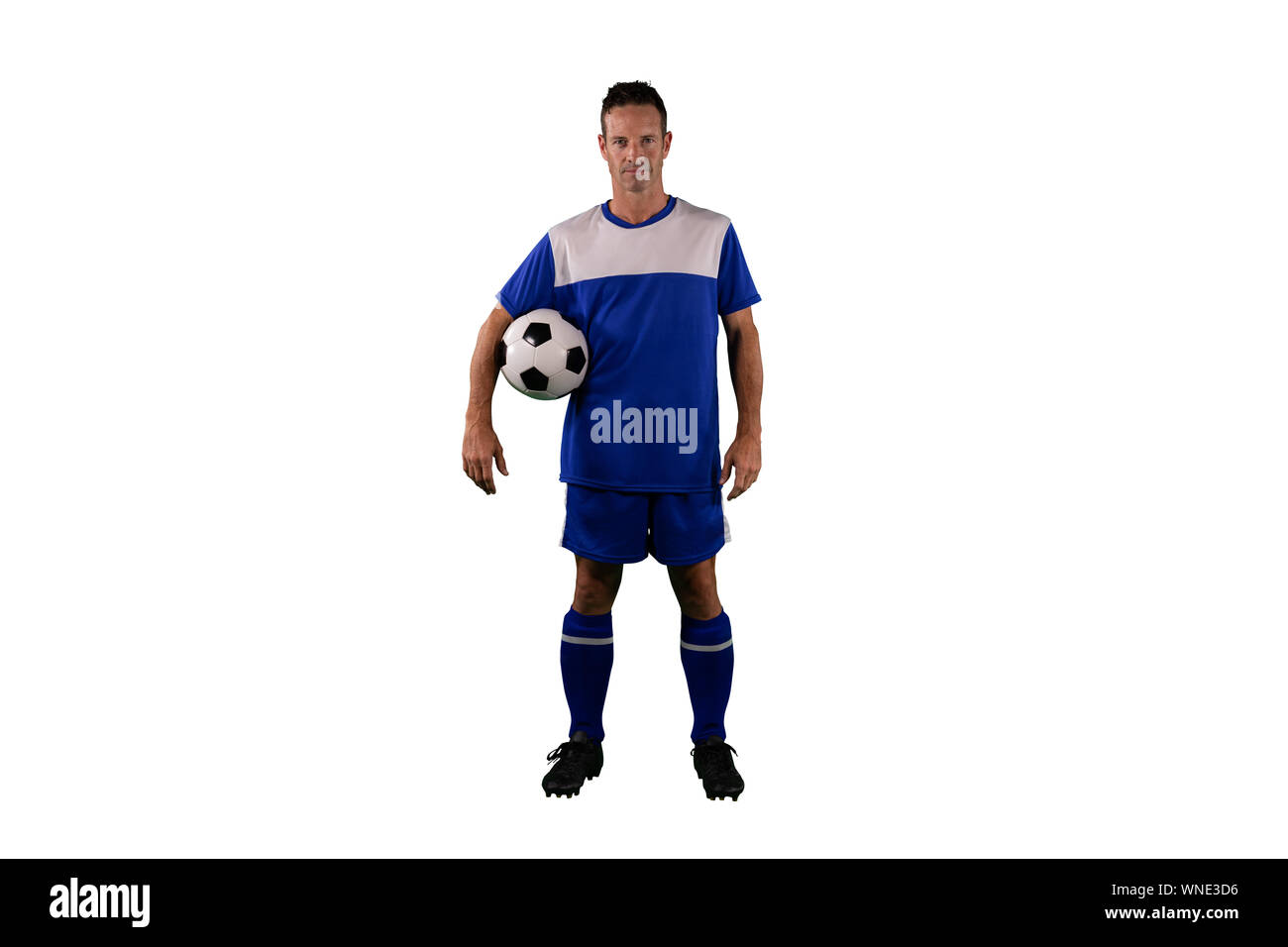 Focused Soccer Player Stock Photo - Alamy