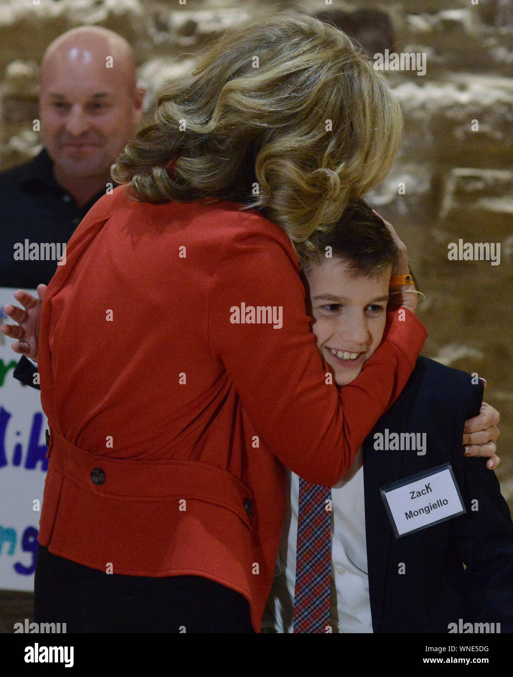 Valerie Mihalek (left) hugs Zach Mongiello, who introduced her before ...