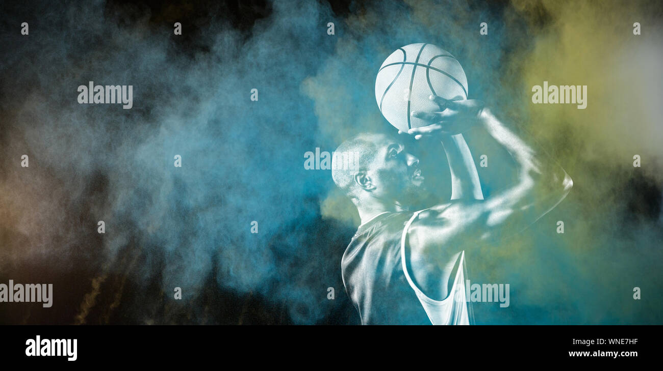 Composite image of basketball player Stock Photo - Alamy