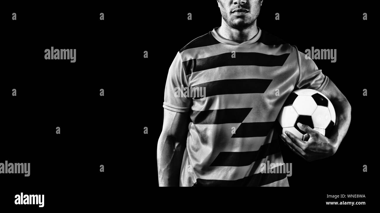 Focused Soccer Player Stock Photo - Alamy