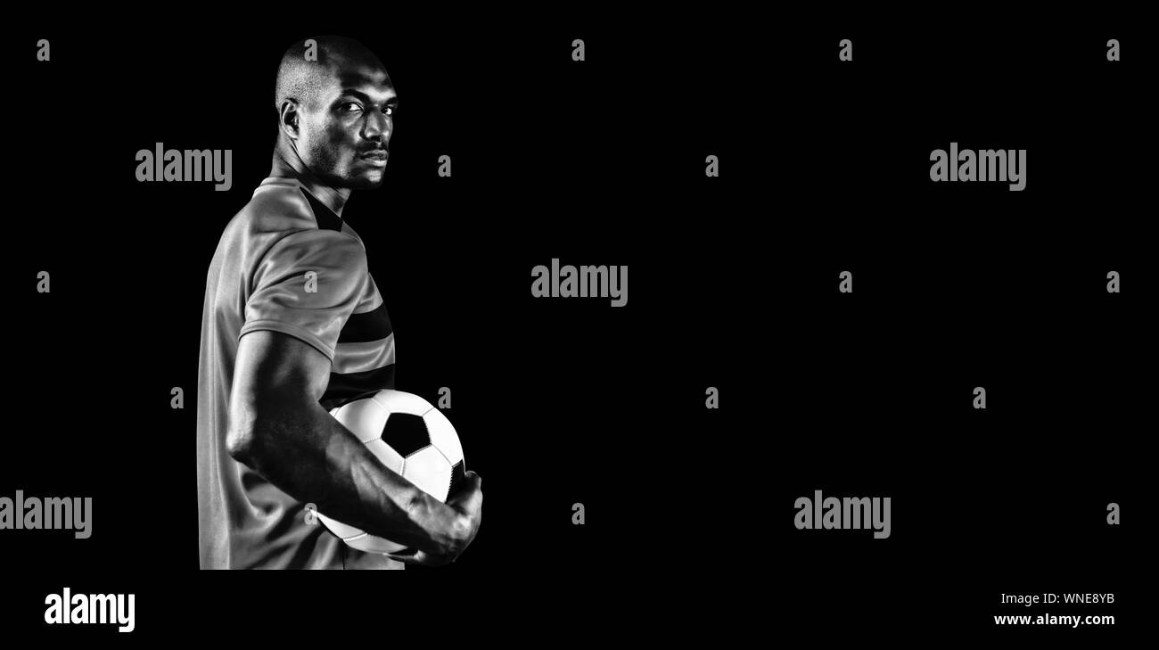 Focused Soccer Player Stock Photo - Alamy