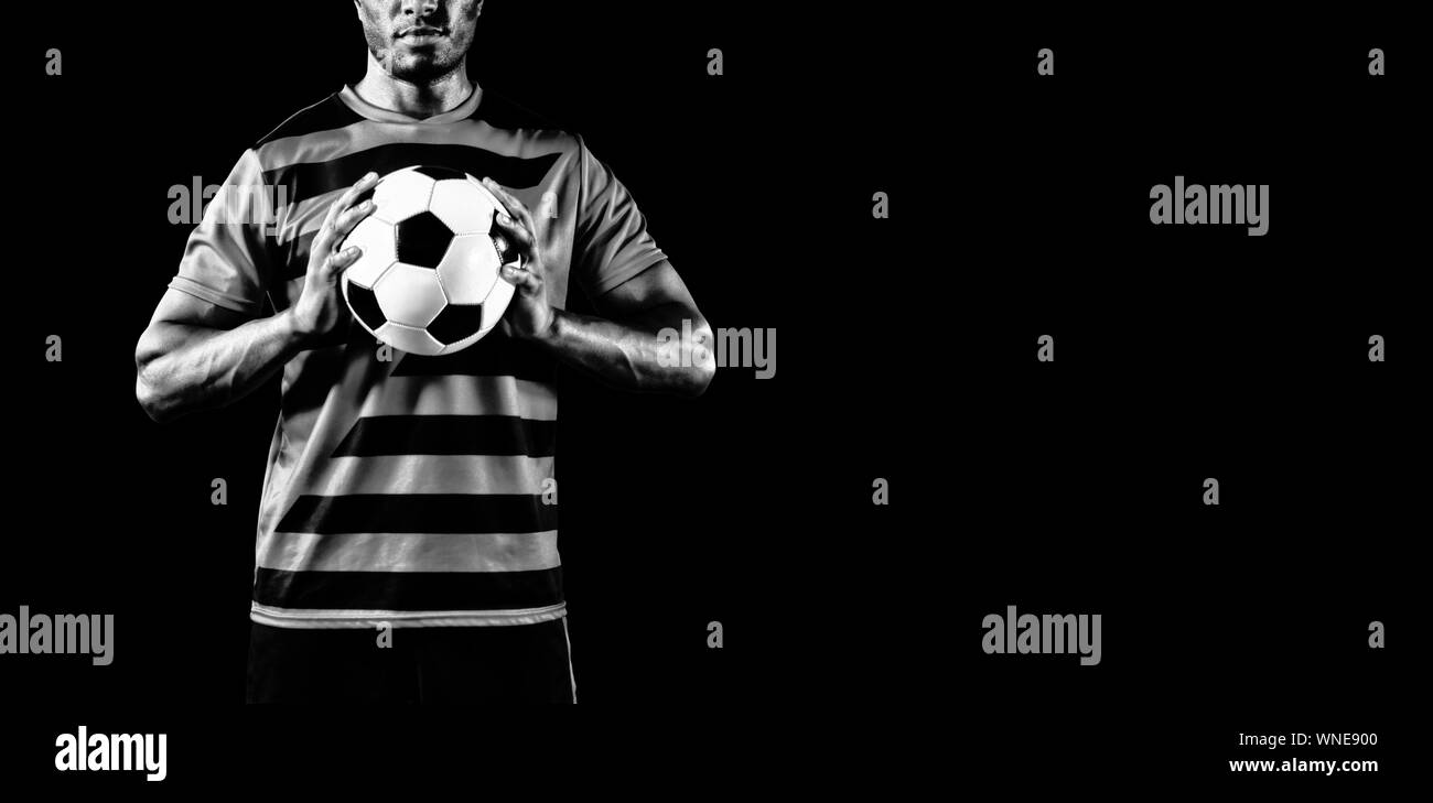 Focused Soccer Player Stock Photo - Alamy