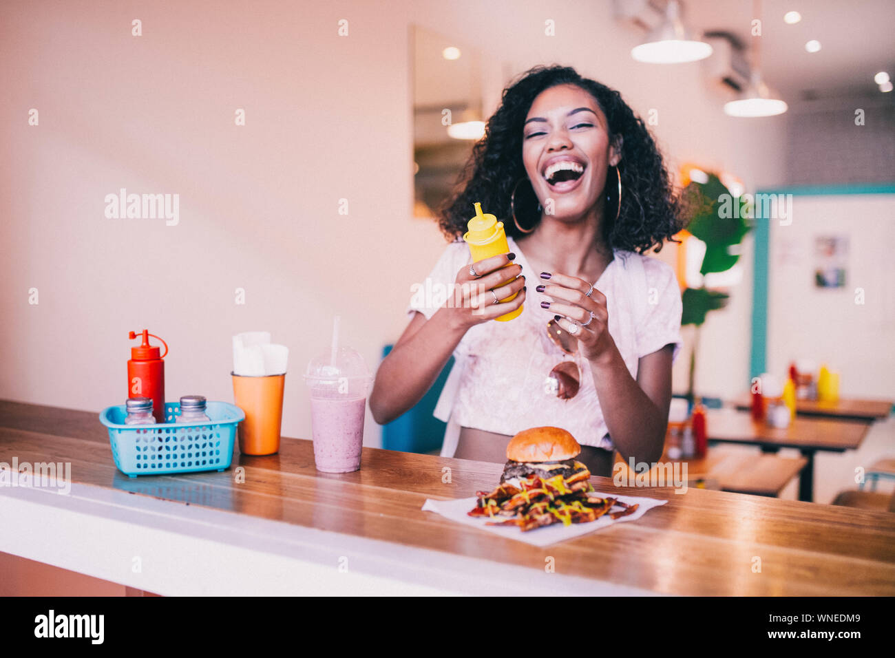 Cheerful eating hi-res stock photography and images - Alamy