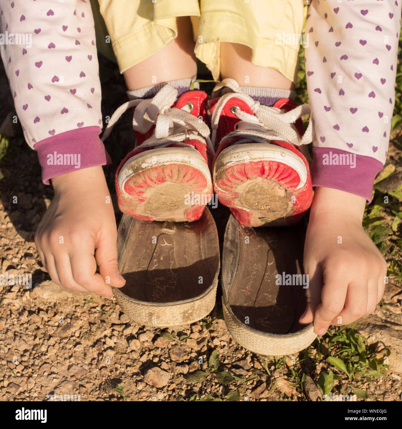 Dirty child shoes hi-res stock photography and images - Alamy