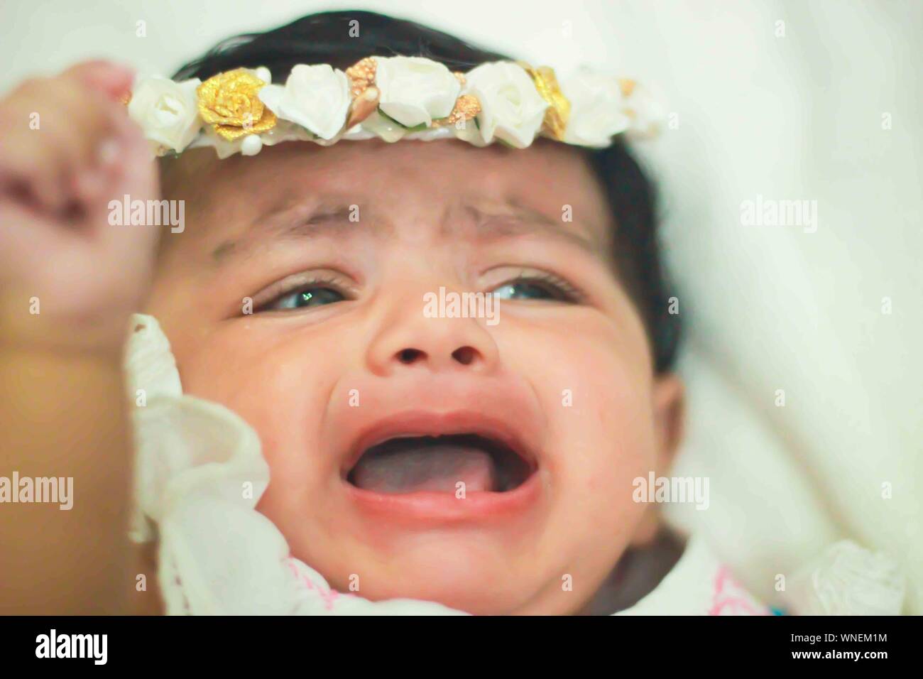 Headshot crying baby hi-res stock photography and images - Alamy