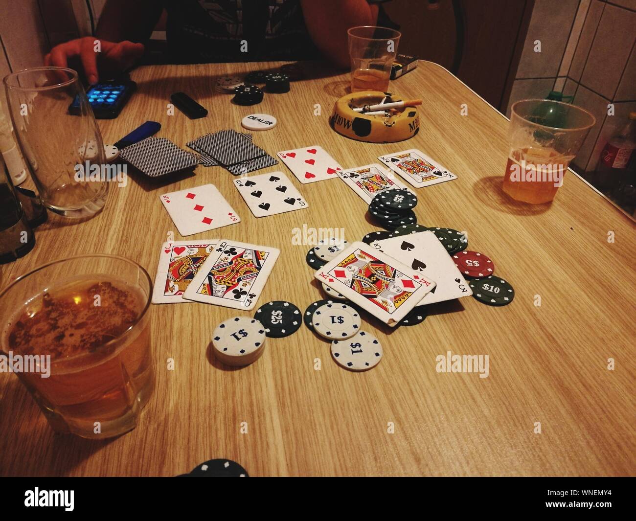 Playing cards and drinking beer hi-res stock photography and images - Alamy
