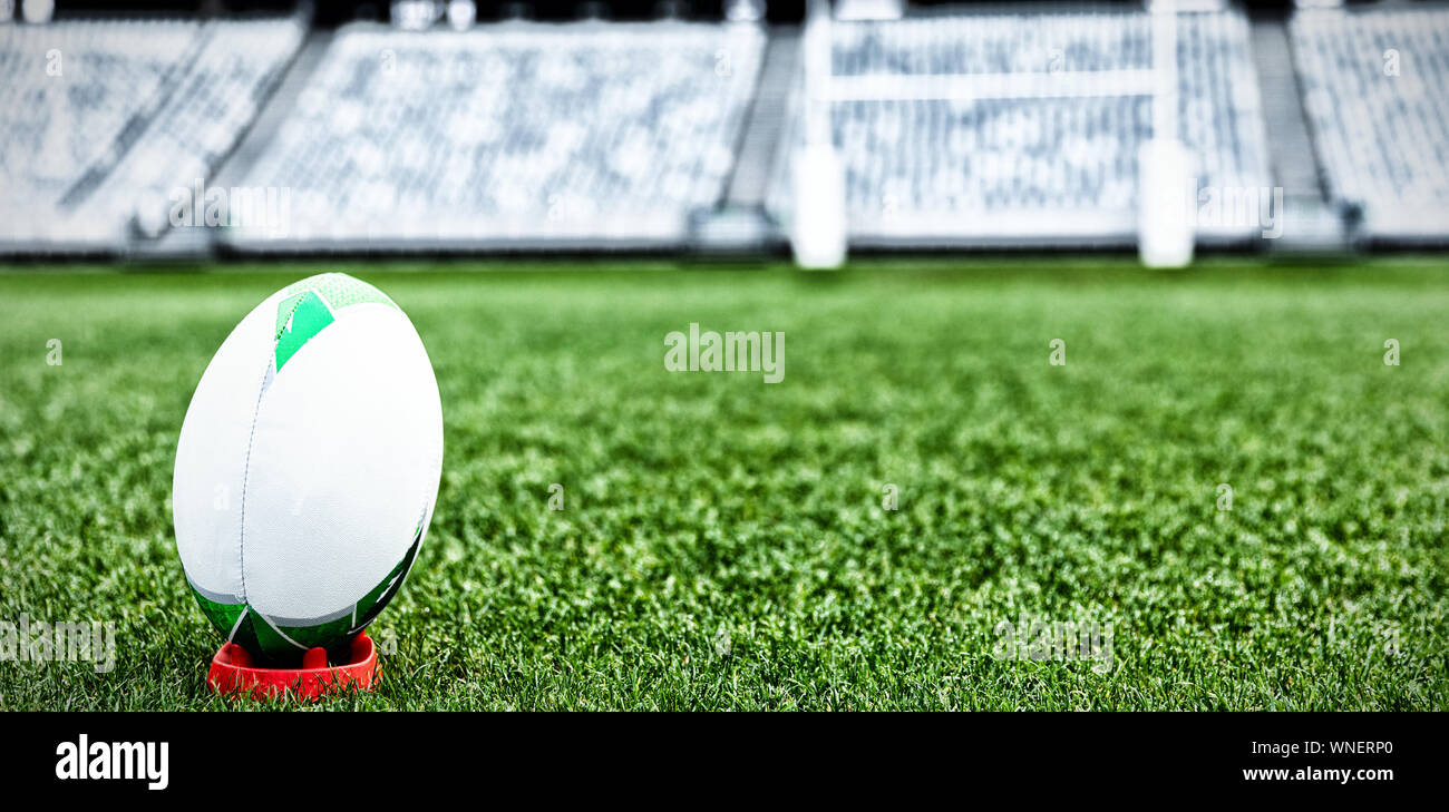 Rugby ball on a stand in stadium Stock Photo - Alamy