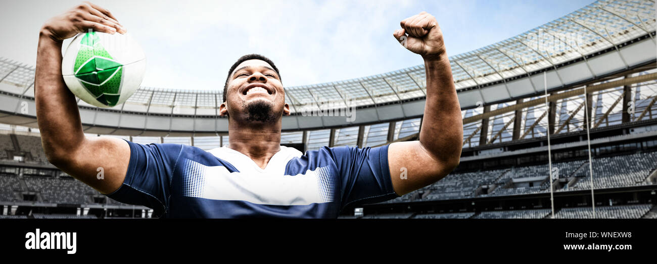 Composite image of strong rugby player Stock Photo - Alamy