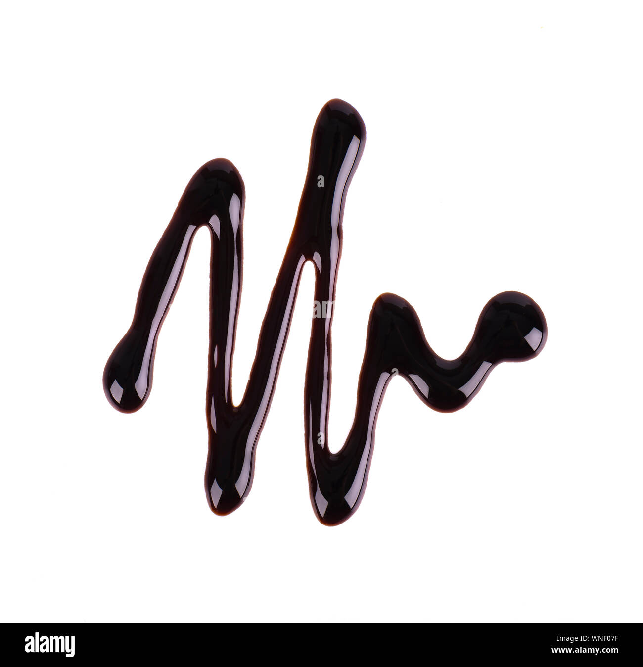 Chocolate syrup drop isolated on white background. Top view Stock Photo ...
