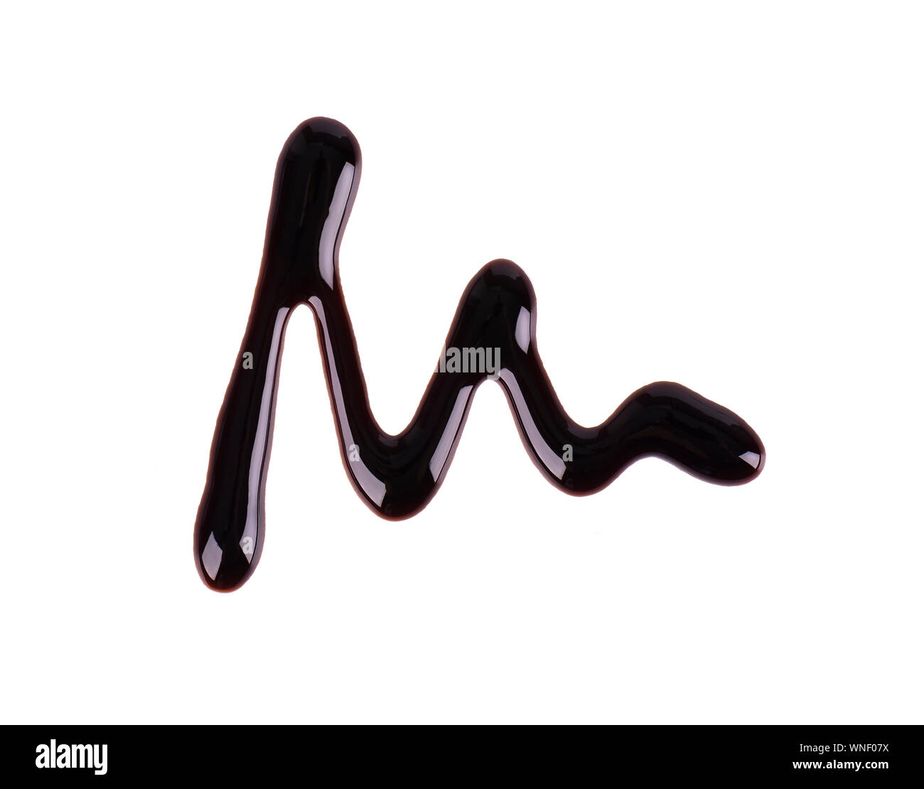Chocolate syrup drop isolated on white background. Top view Stock Photo ...