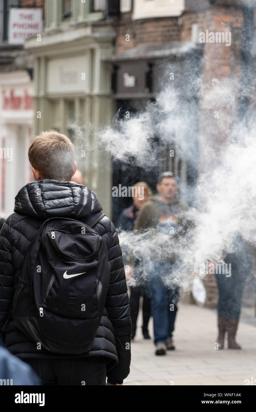 Young male man vaping in the street hi-res stock photography and images ...