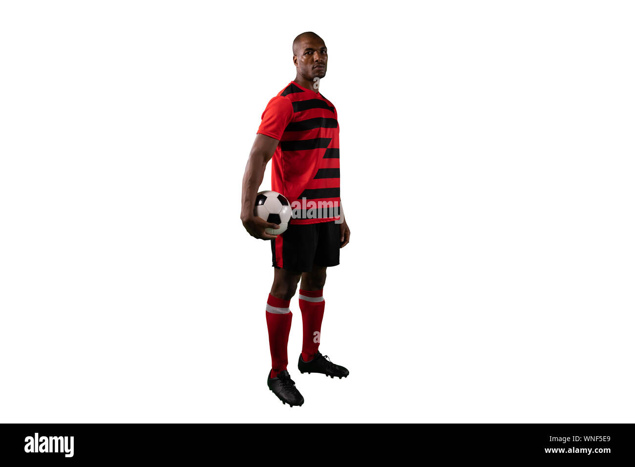 Focused Soccer Player Stock Photo - Alamy