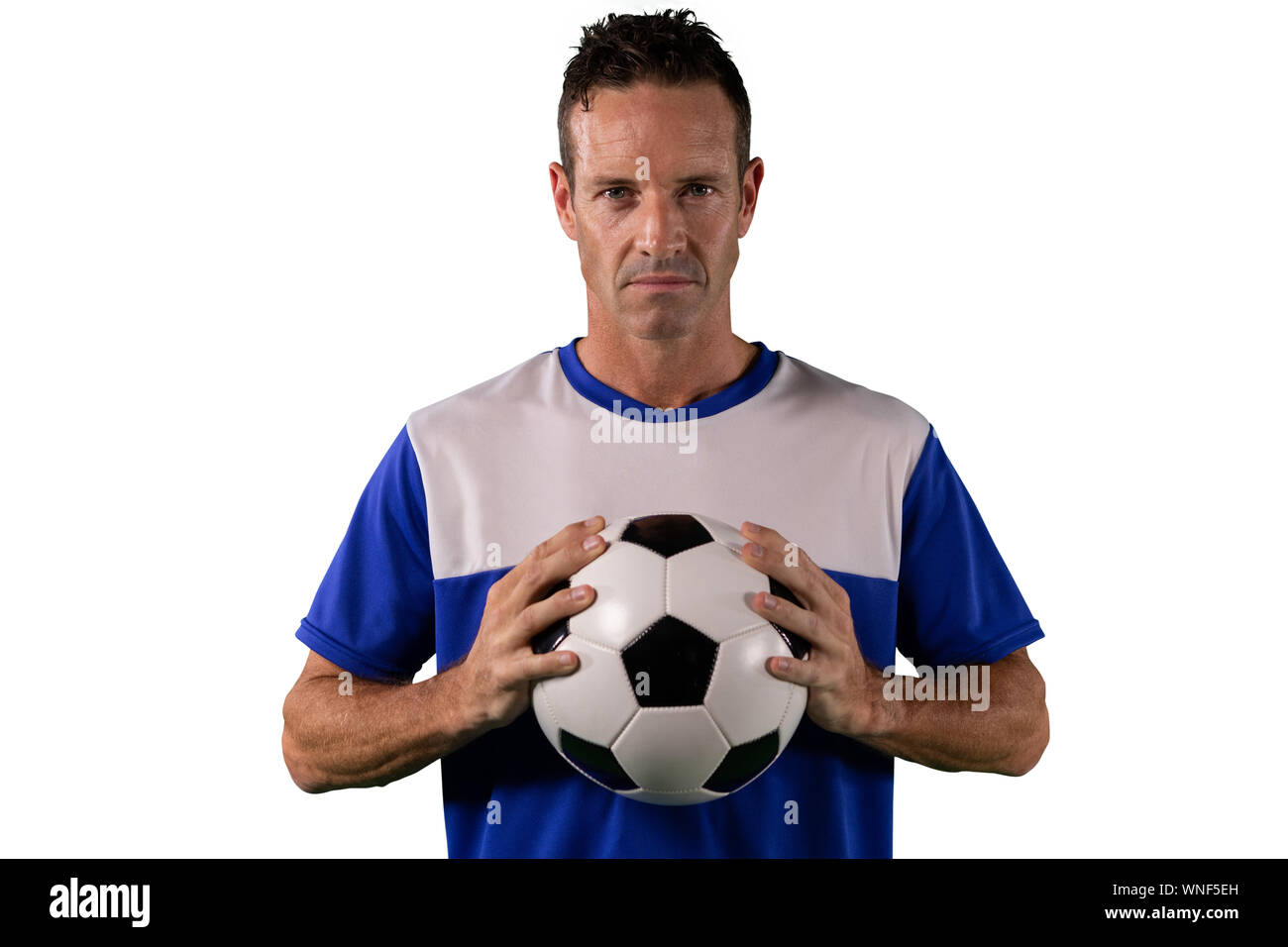 Focused Soccer Player Stock Photo - Alamy