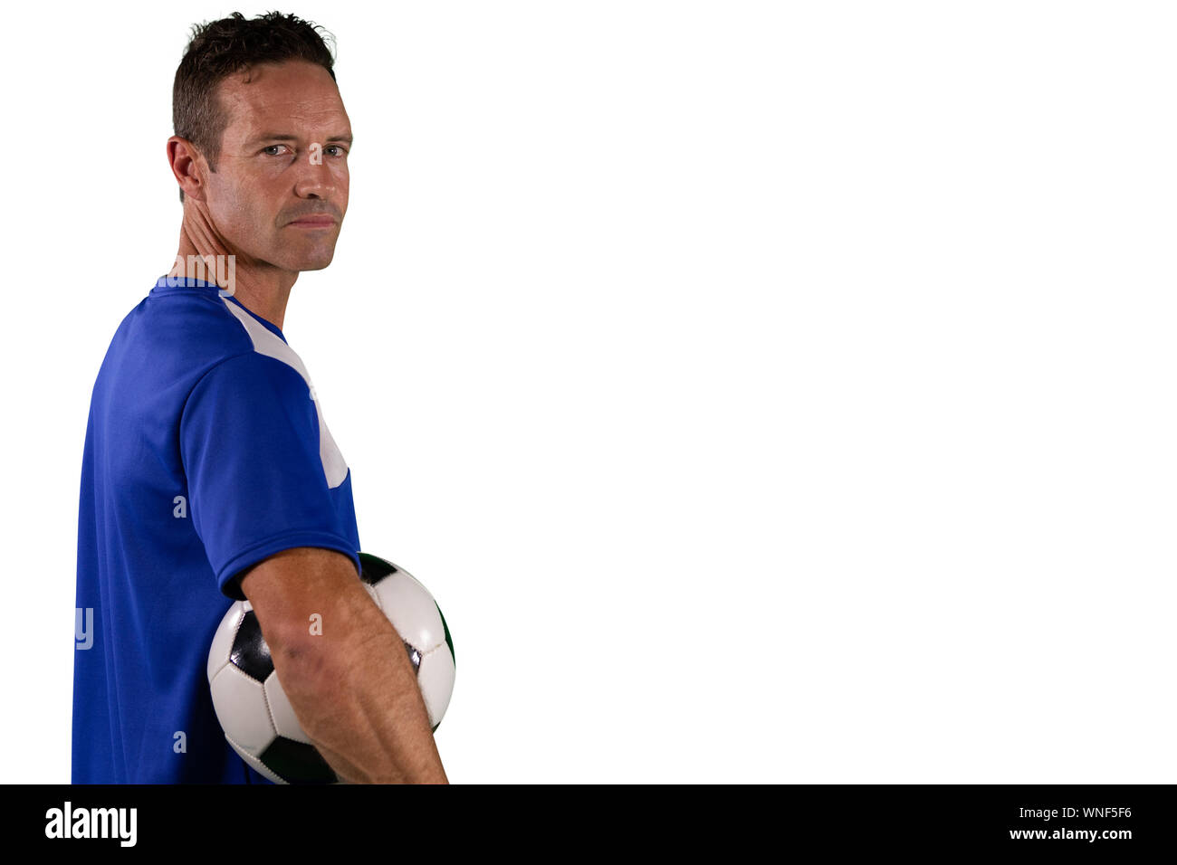 Focused Soccer Player Stock Photo - Alamy