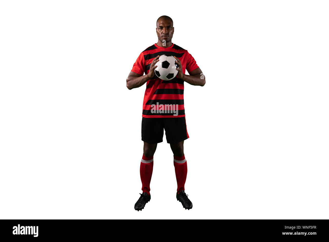 Focused Soccer Player Stock Photo - Alamy