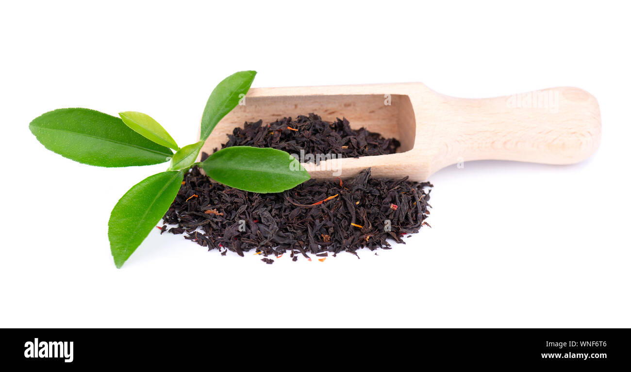 Black Ceylon tea with flower petals and bergamot, isolated on white ...
