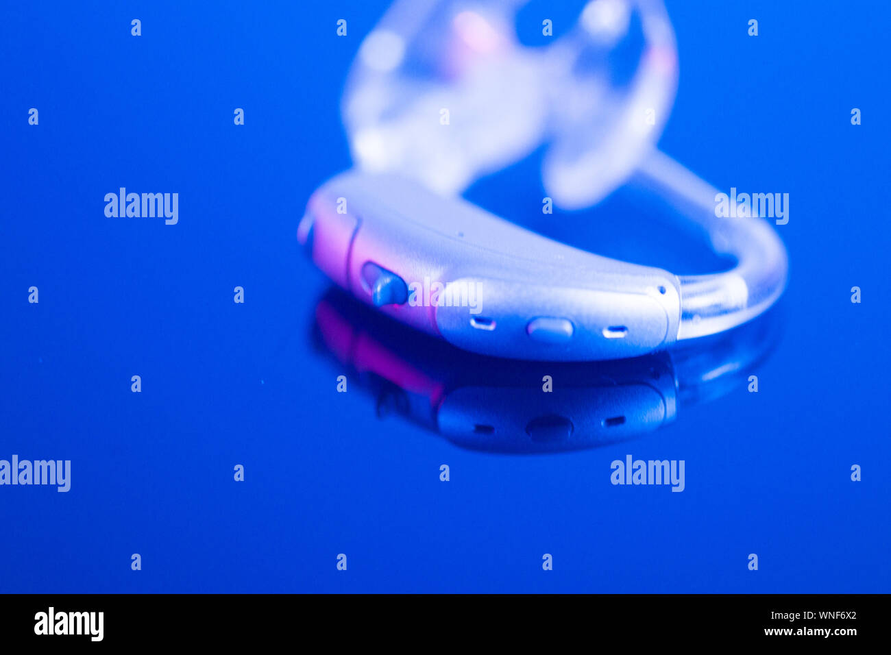Modern digital hearing aid for deafness and deaf people Stock Photo - Alamy