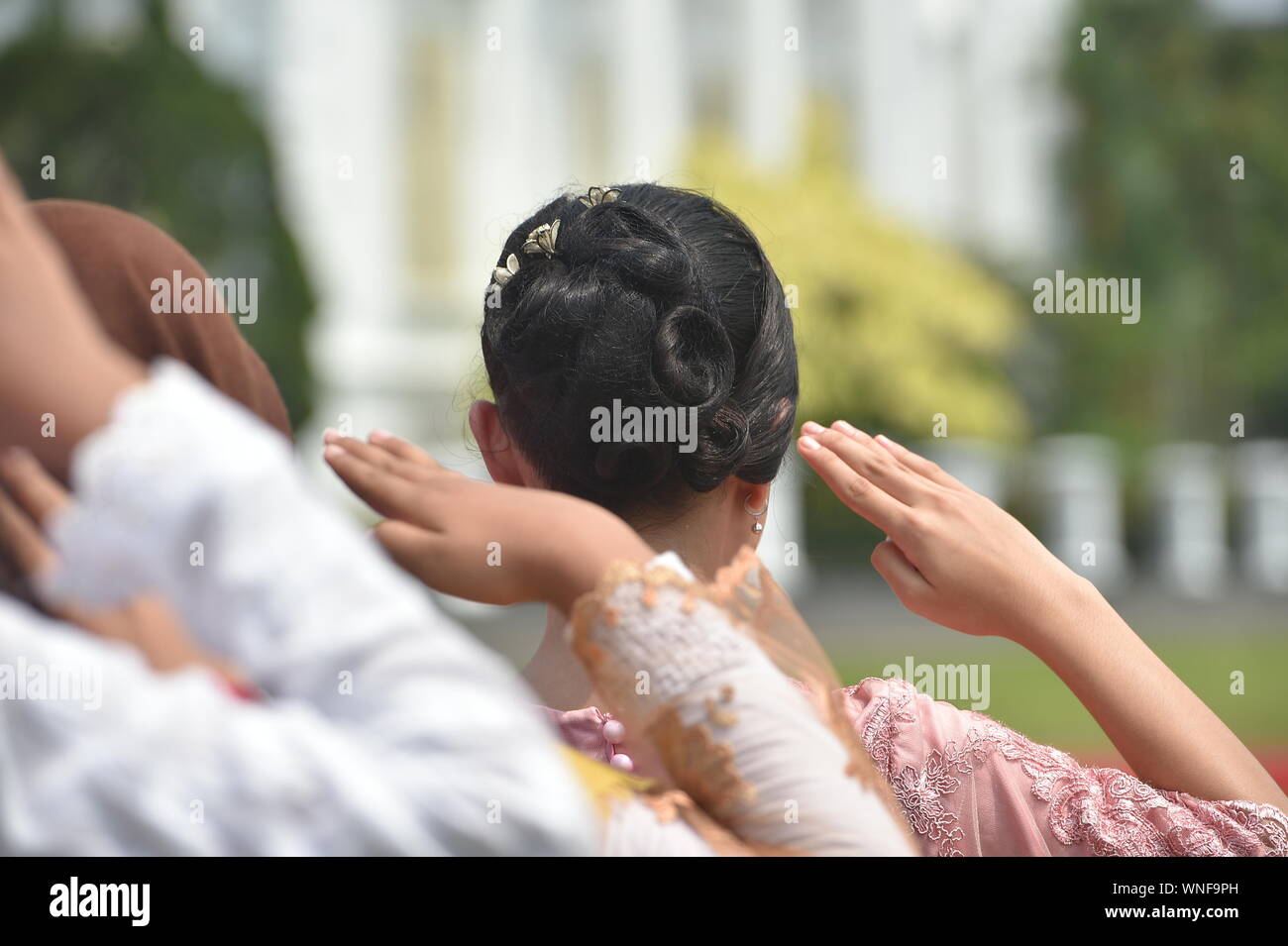 Woman saluting hi-res stock photography and images - Alamy