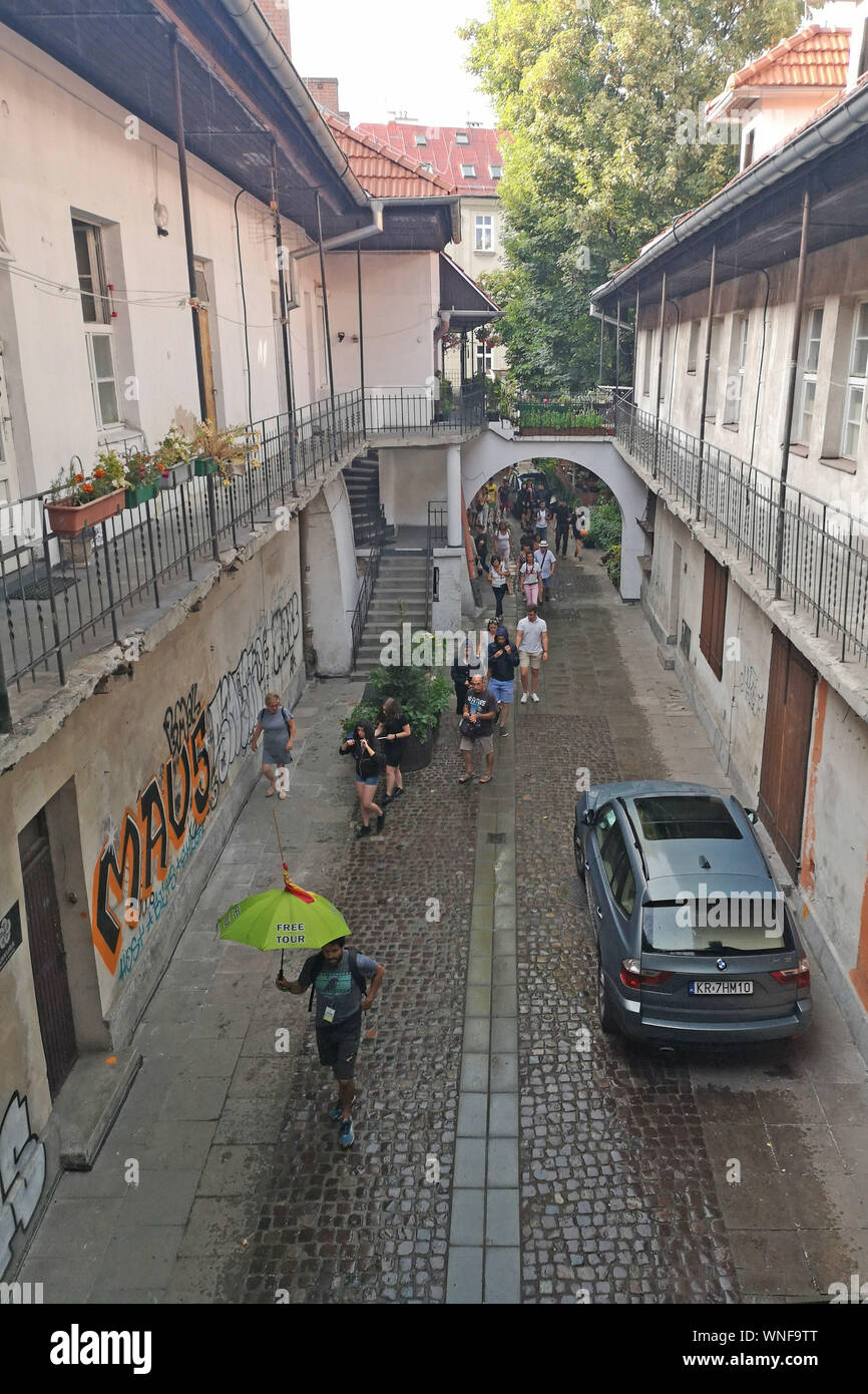 Tourists visit Mrs. Dresner courtyard and stairs made famous from the ...