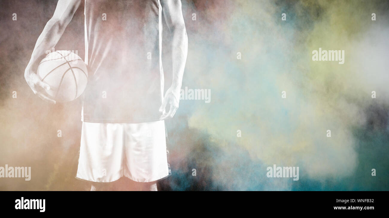Composite image of basketball player Stock Photo - Alamy