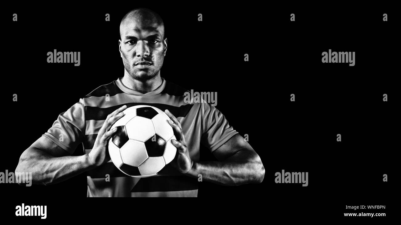 Focused Soccer Player Stock Photo - Alamy