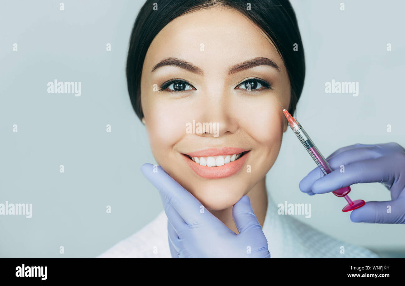 Girl gets an injection hi-res stock photography and images - Alamy