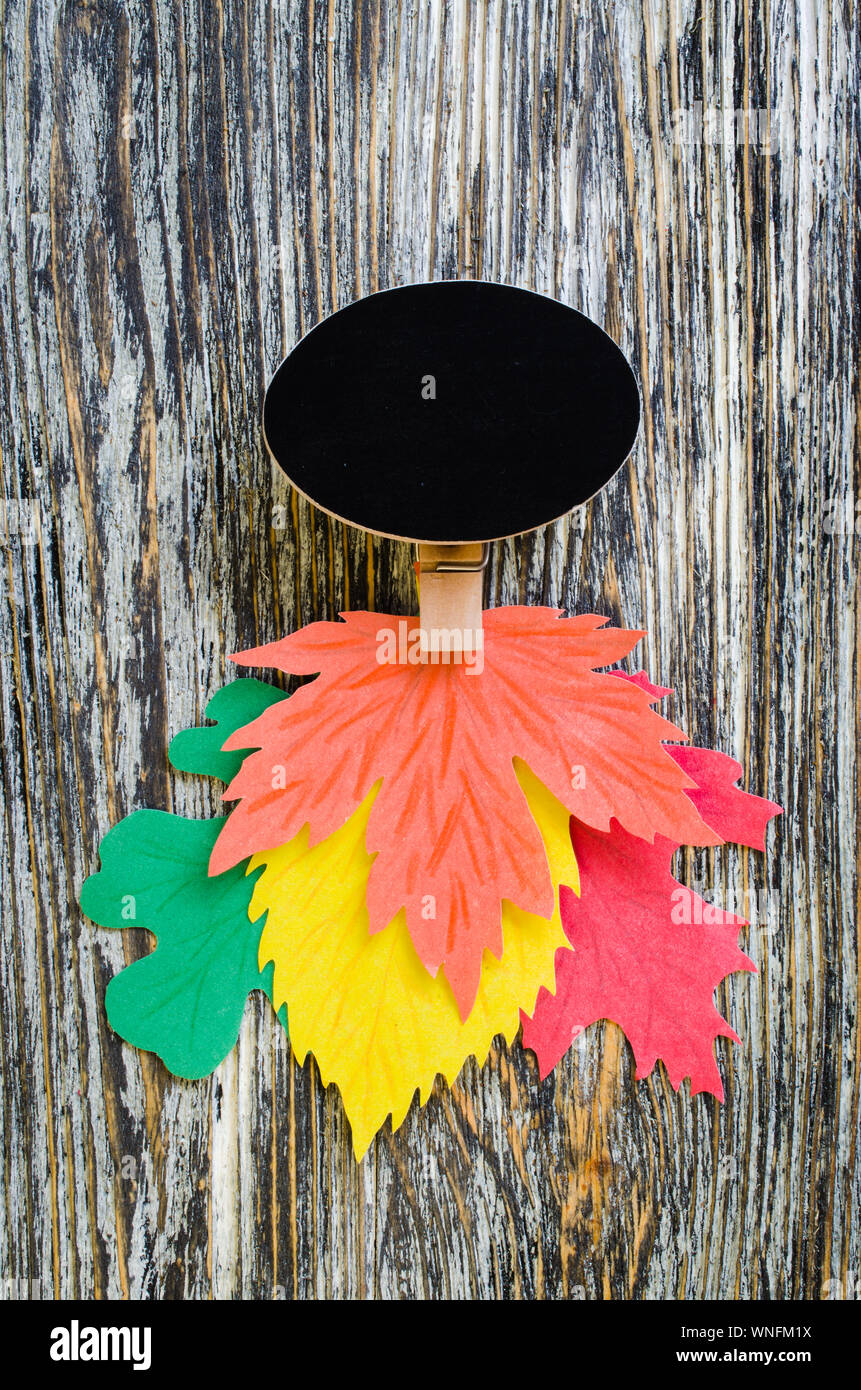 Autumn background: chalk board with colorful paper leaves on vintage ...