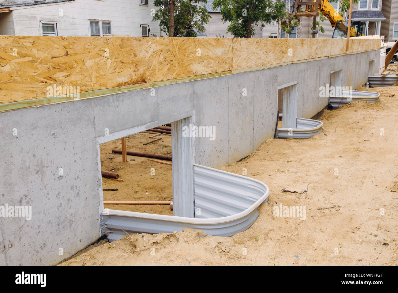 Installation of the wooden frame house construction flooring base under ...