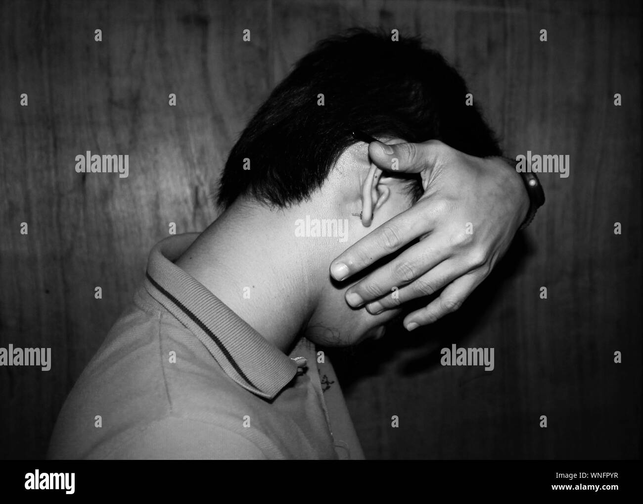 Covering His Face With Hand Black and White Stock Photos & Images - Alamy